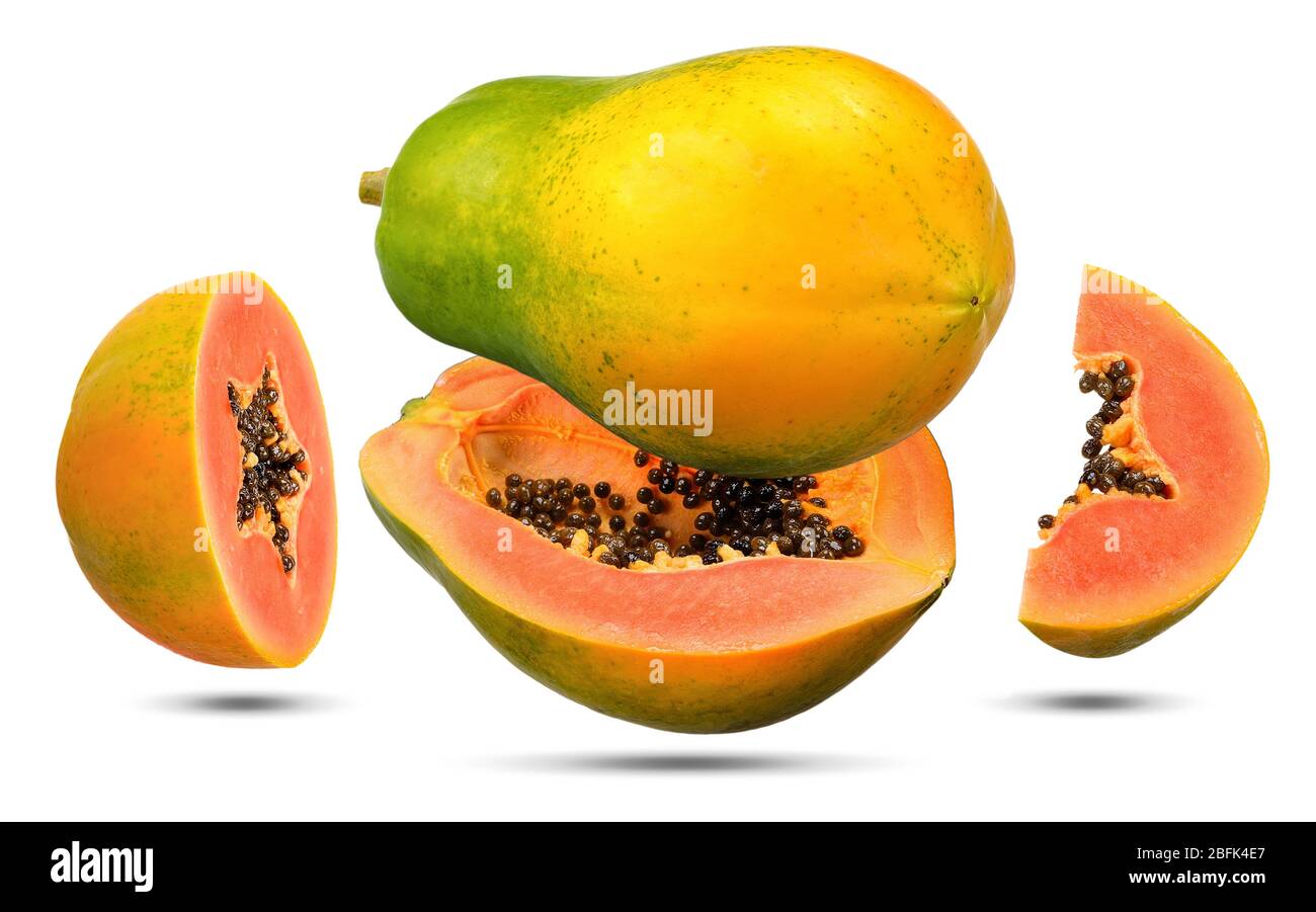 Ripe papaya and half slice isolated on white, papaya clipping path ...