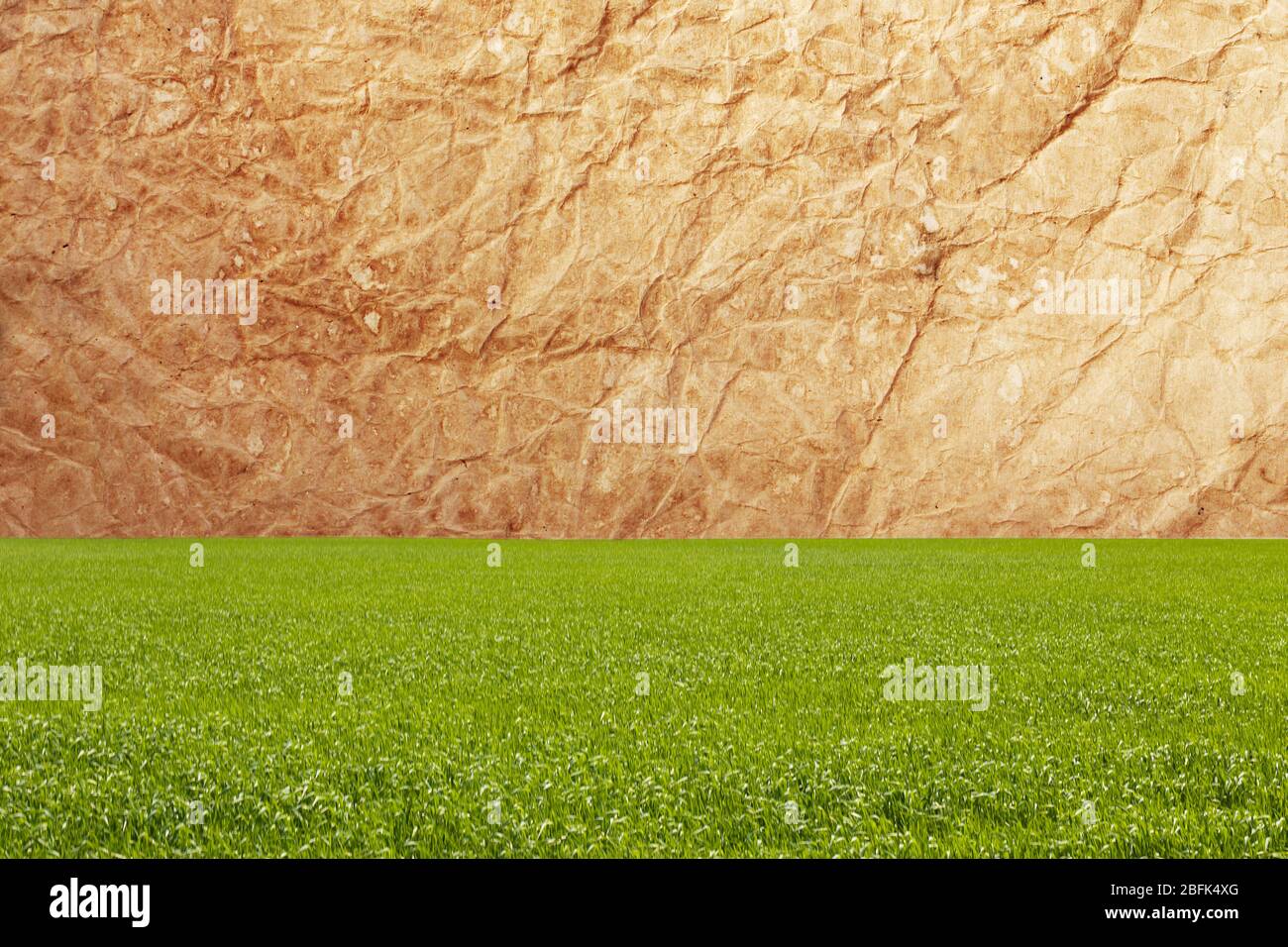 Beautiful green field on old paper texture background Stock Photo - Alamy