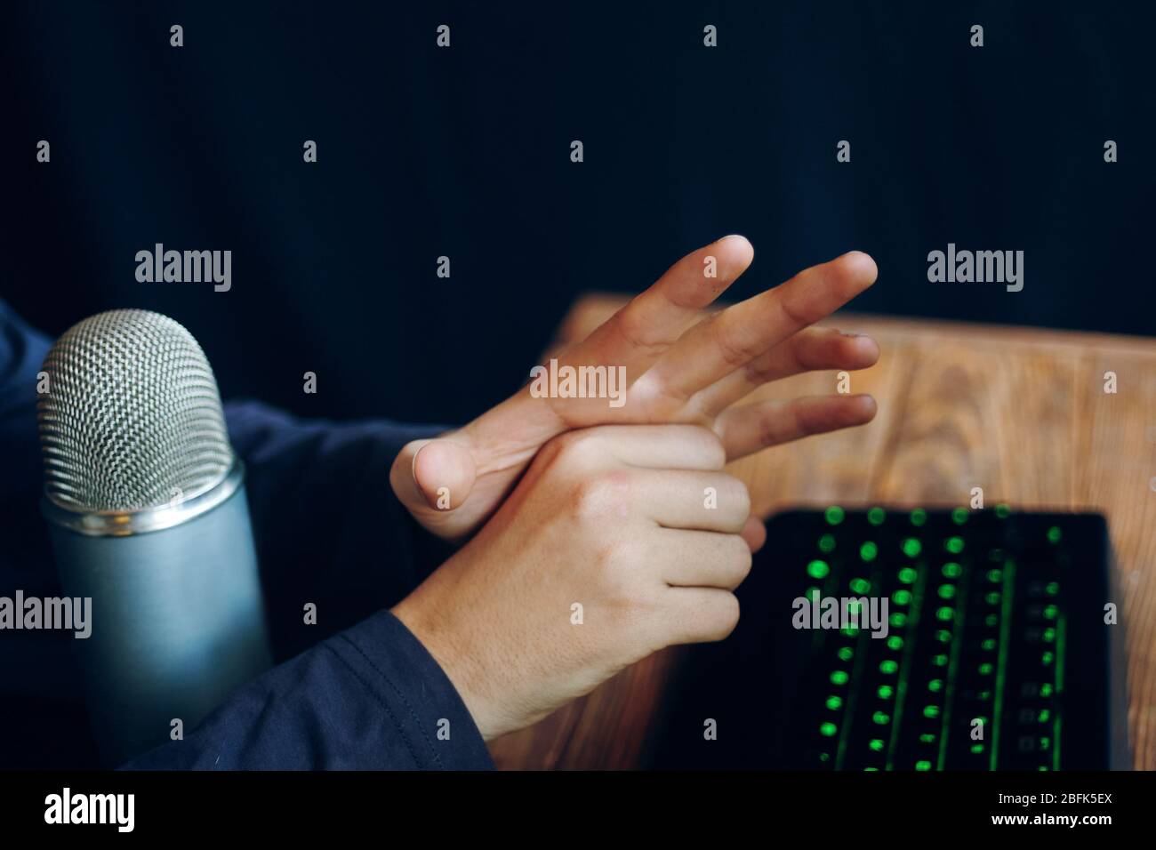 Angry gamer streamer show gestures. Man shows sings of future victory ...