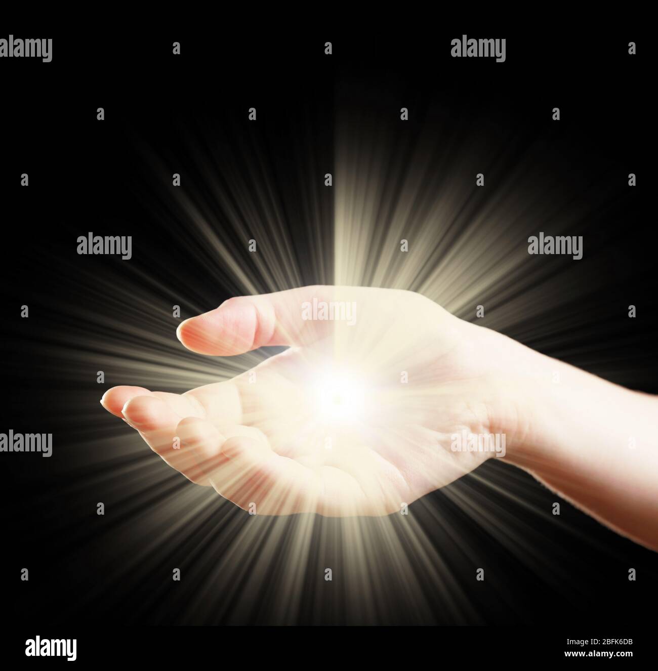 The light in young woman hand Stock Photo - Alamy