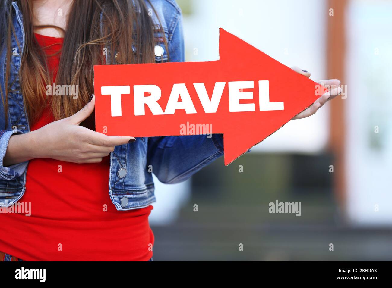 Travel concept. Pointer in female hands, outdoors Stock Photo - Alamy