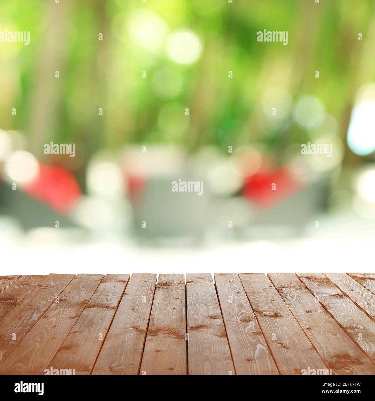 Wooden table with abstract blur background Stock Photo - Alamy