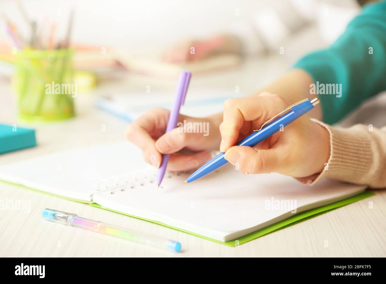Hands of students at school, close up Stock Photo - Alamy