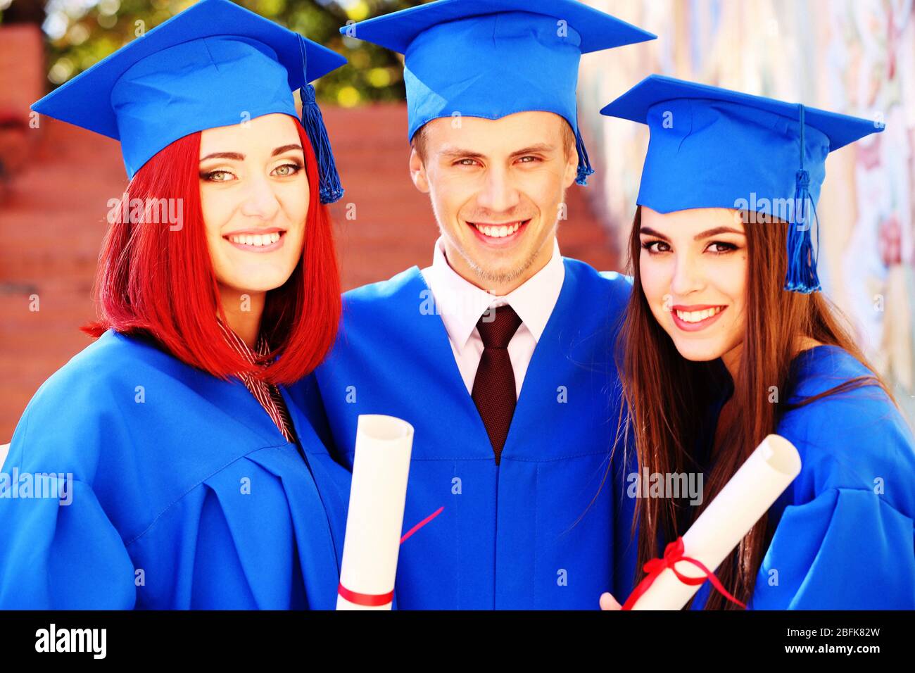 Blue graduation gowns hi-res stock photography and images - Alamy