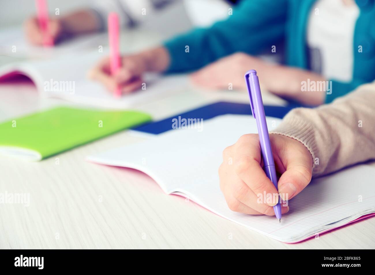 Hands of students at school, close up Stock Photo - Alamy