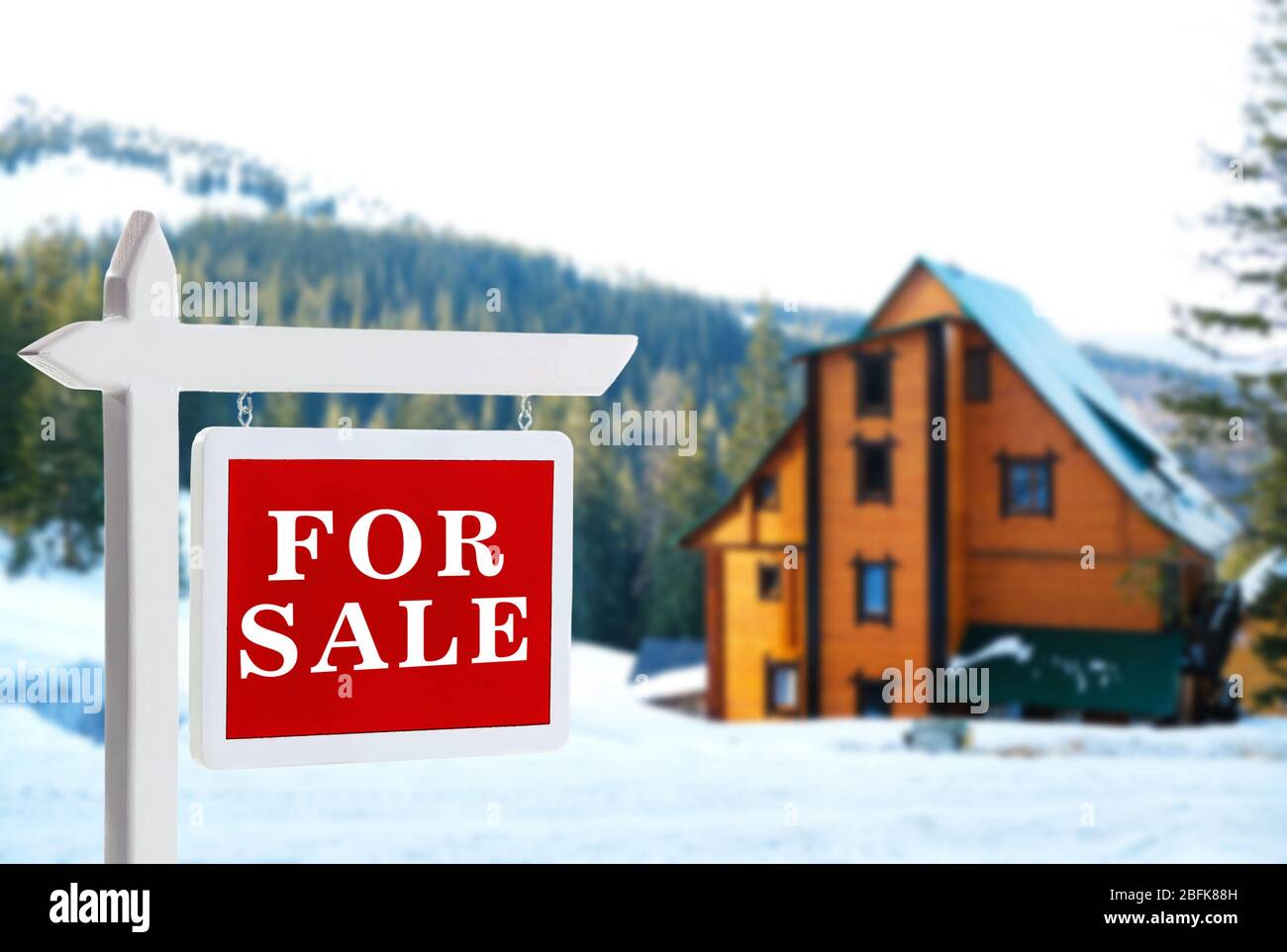 Real estate sign in front of new house for sale Stock Photo - Alamy
