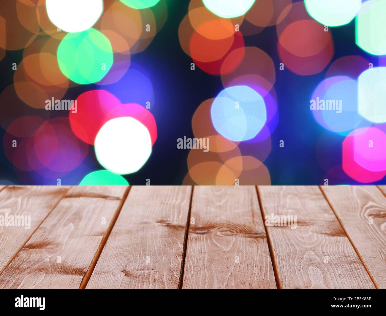Wooden table with abstract blur background Stock Photo - Alamy