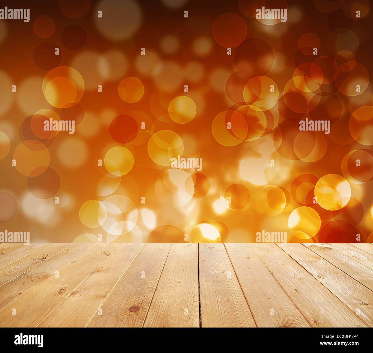 Wooden table with abstract blur background Stock Photo - Alamy