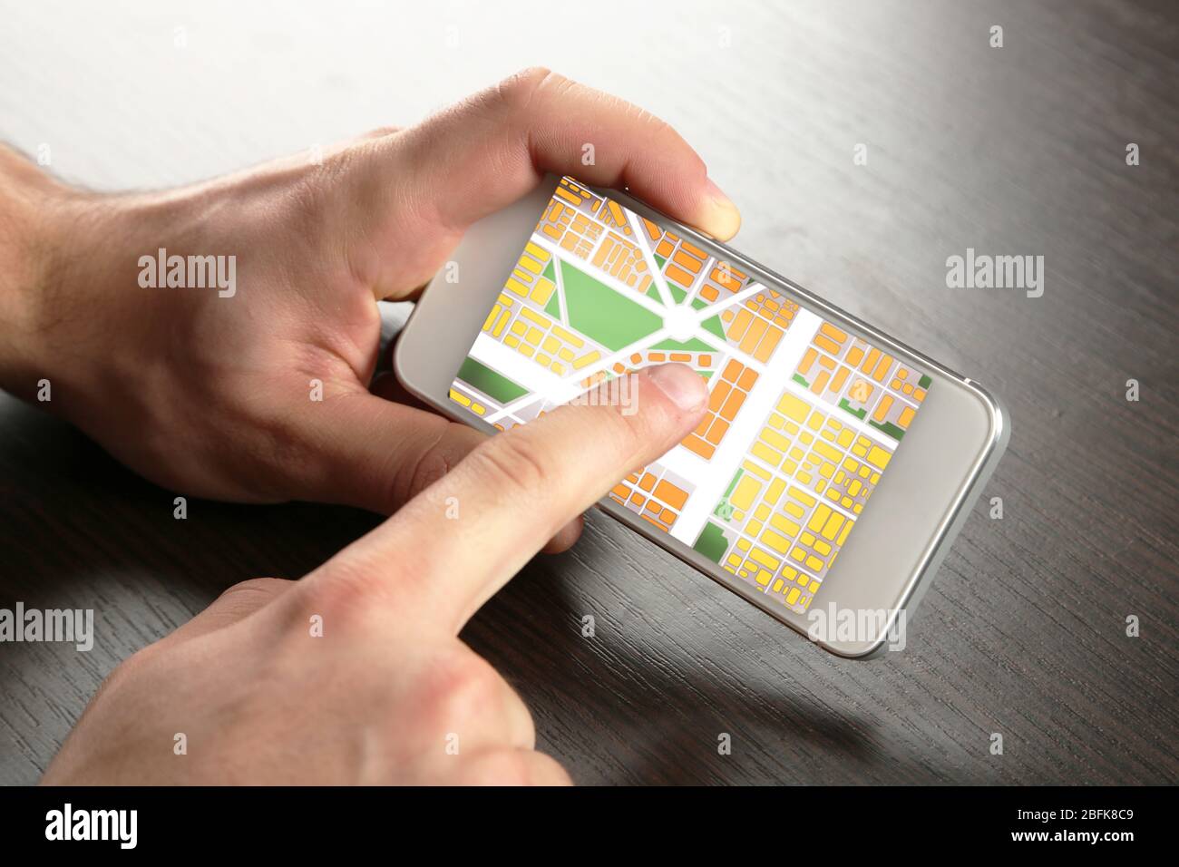 Smart phone with map gps navigation application Stock Photo - Alamy