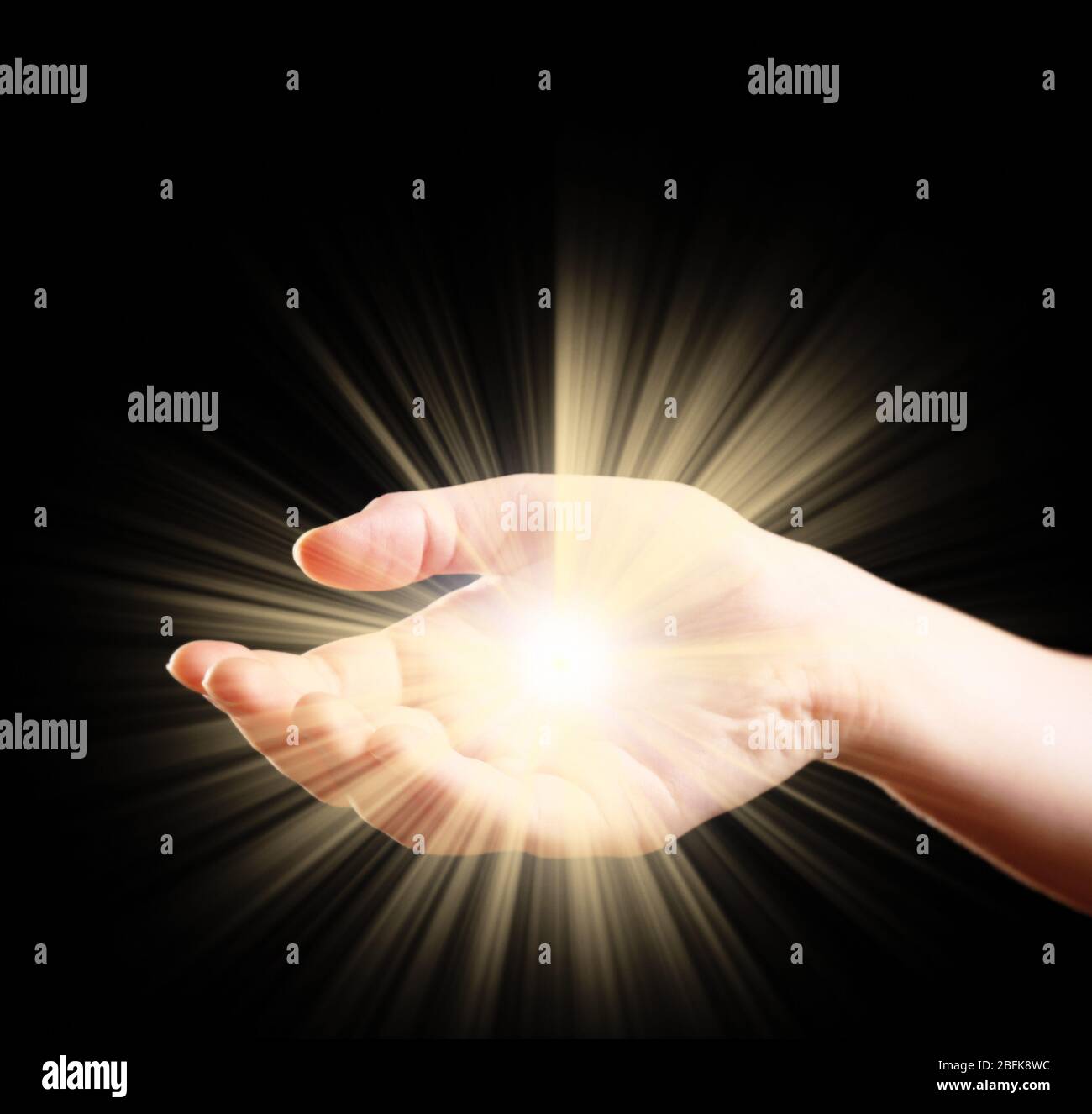The light in young woman hand Stock Photo - Alamy