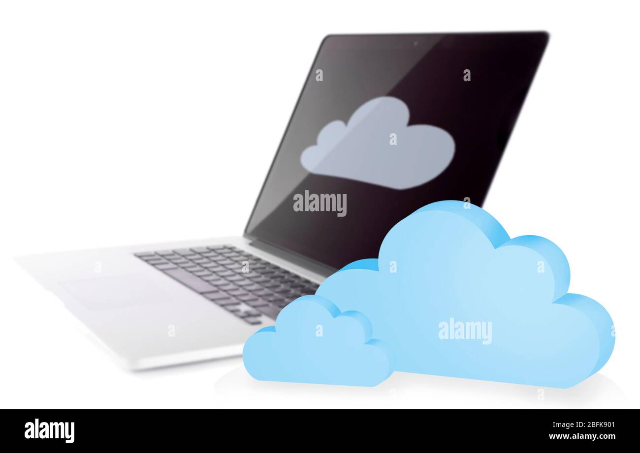 Laptop with clouds. Cloud computing concept Stock Photo - Alamy
