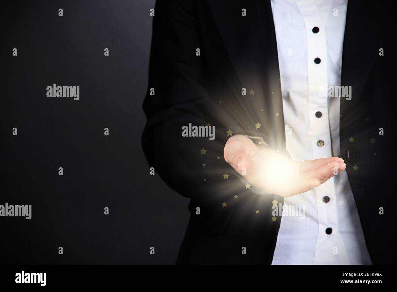 The light in young woman hand Stock Photo - Alamy