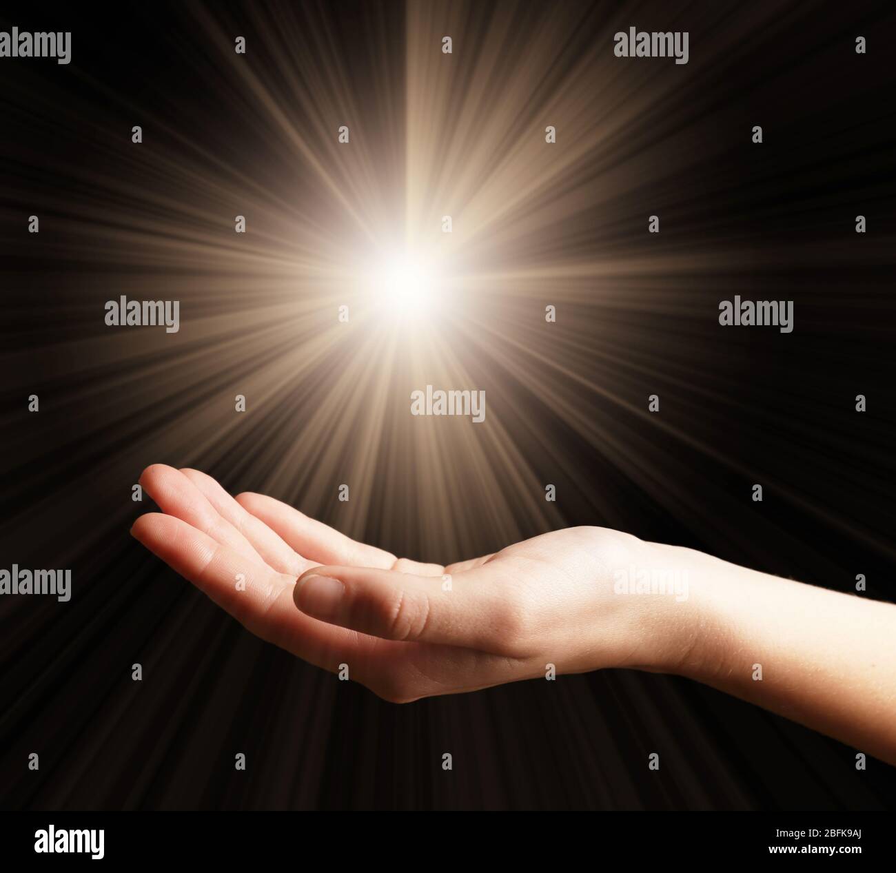 The light in young woman hand Stock Photo - Alamy