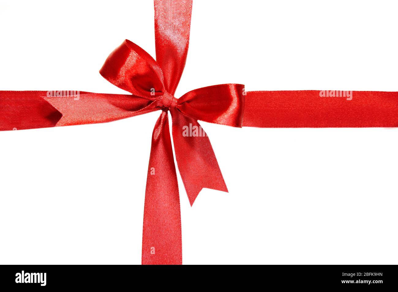 Shiny red ribbon with bow isolated on white Stock Photo - Alamy
