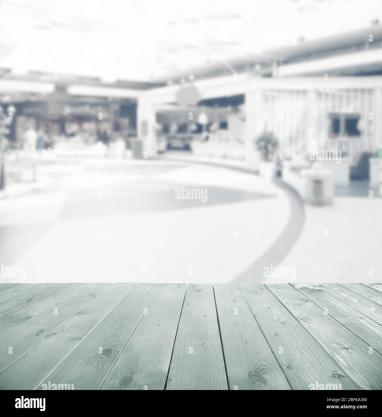 Wooden table with abstract blur background Stock Photo - Alamy
