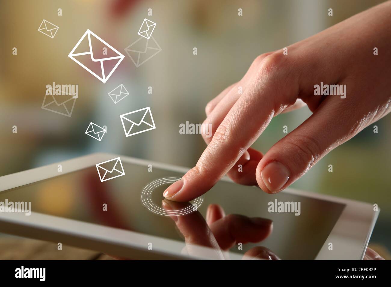 Email concept with tablet and hand Stock Photo - Alamy