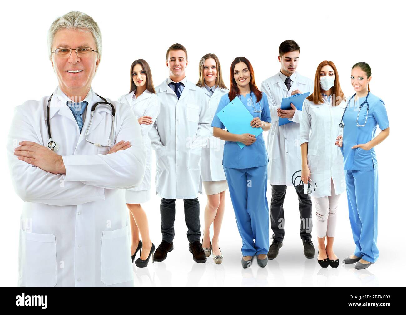 Group of smiling medical doctors isolated on white Stock Photo - Alamy