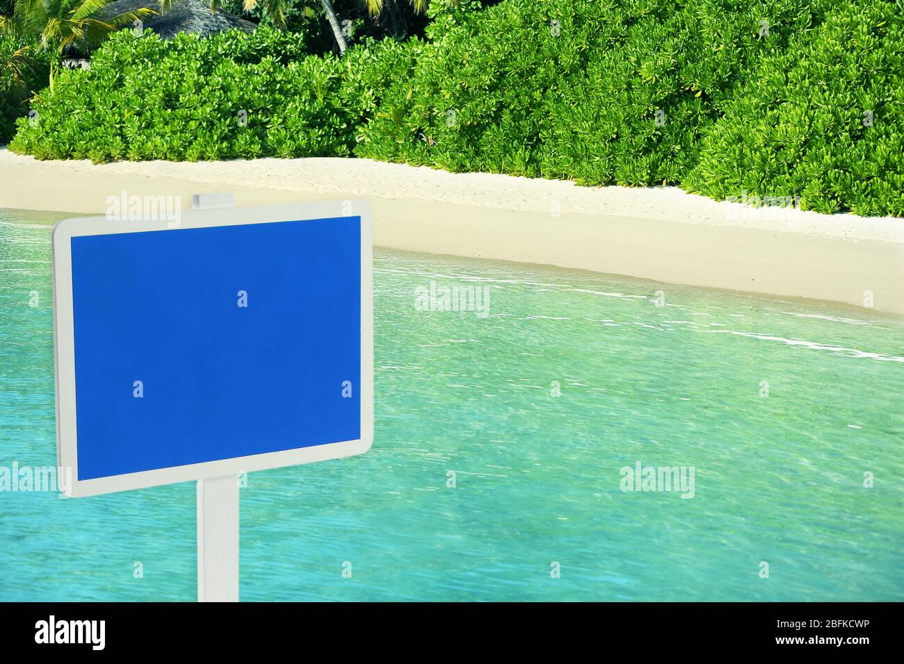 Wooden sign board on nature background Stock Photo - Alamy