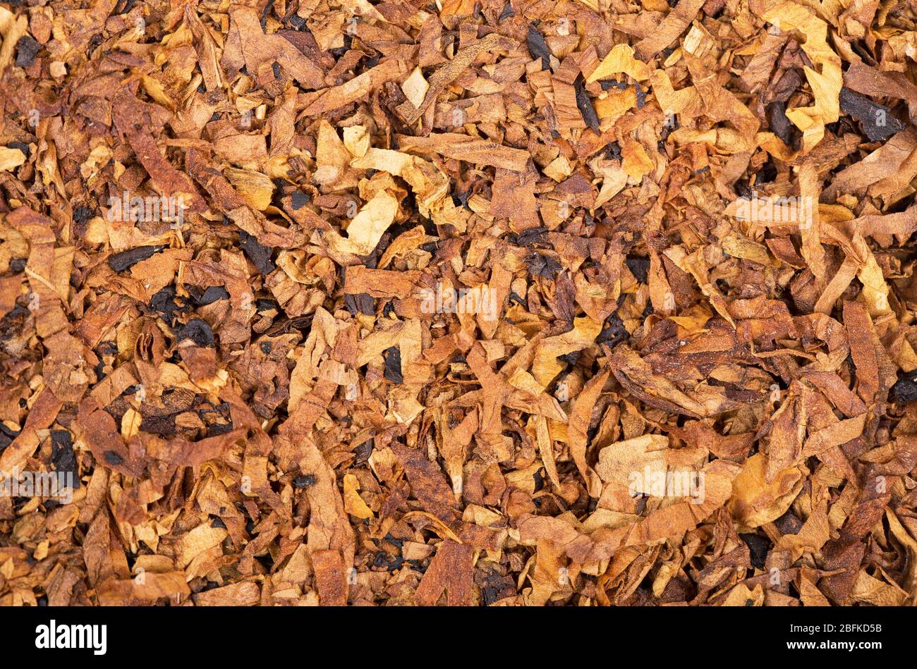 A background of tobacco flakes Stock Photo - Alamy