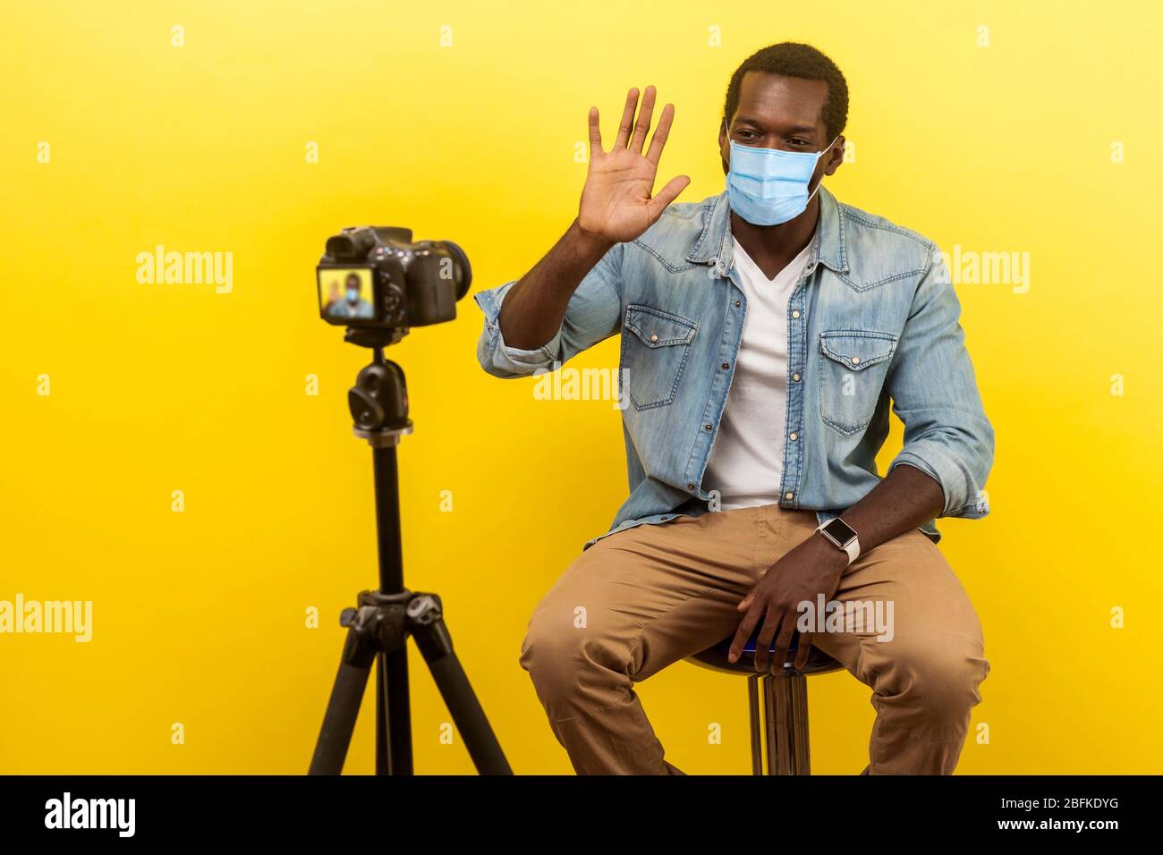 Footage smiling man waving camera hi-res stock photography and images ...