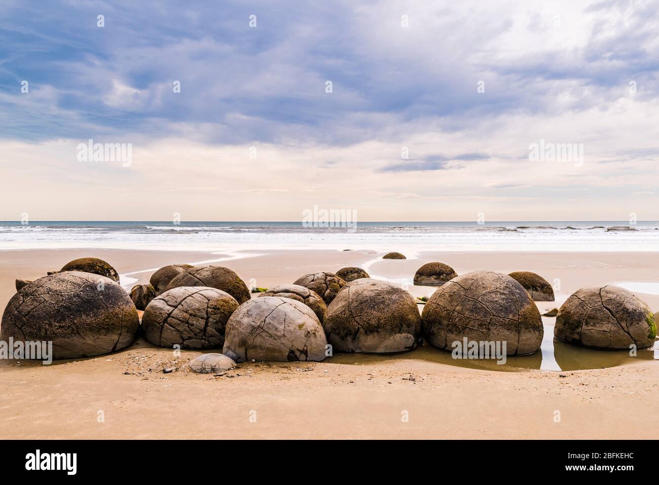 Group of large rock boulders on Moeraki Beach, Otago, New Zealand Stock ...