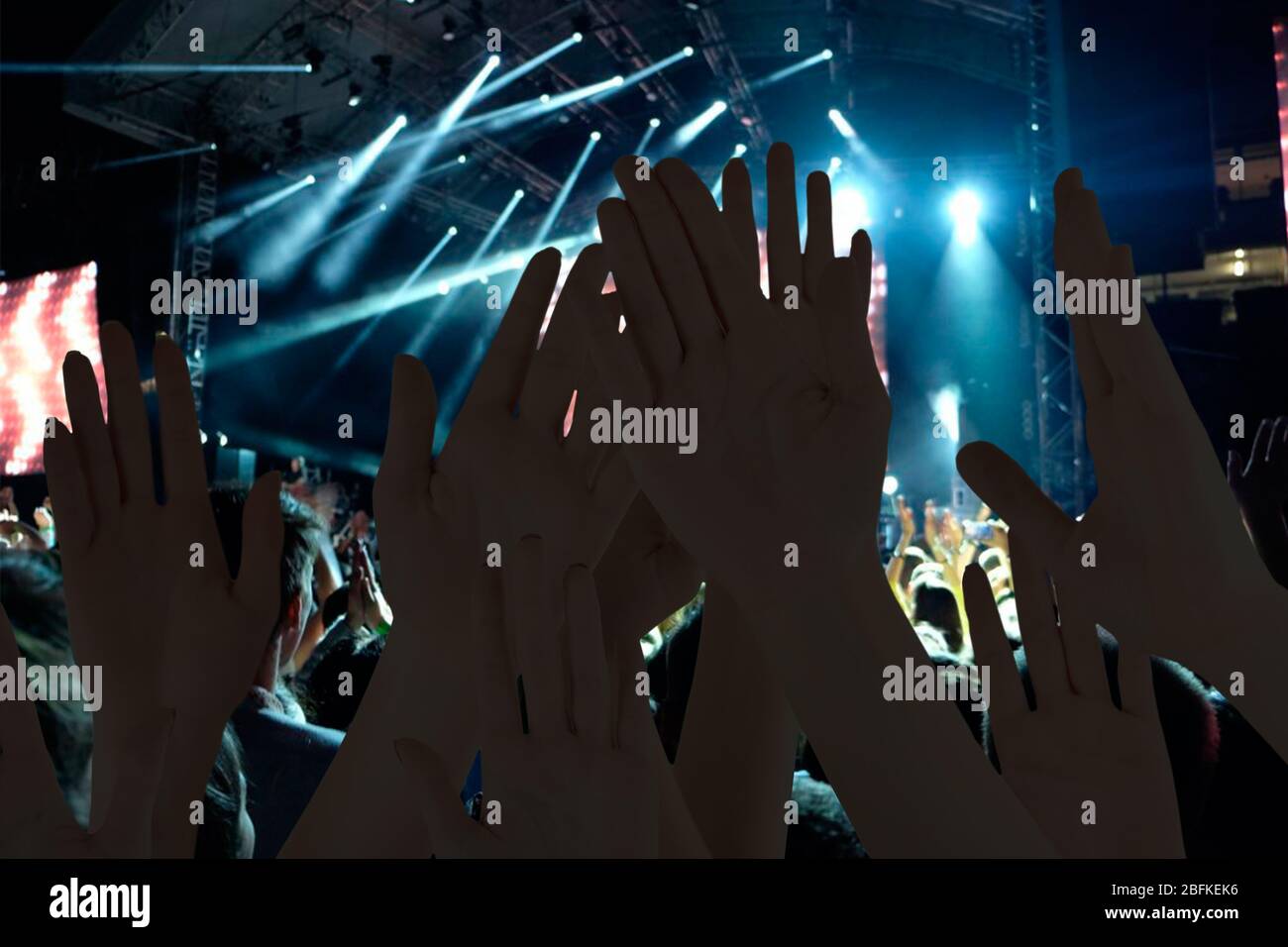 raised up hands on concert Stock Photo - Alamy