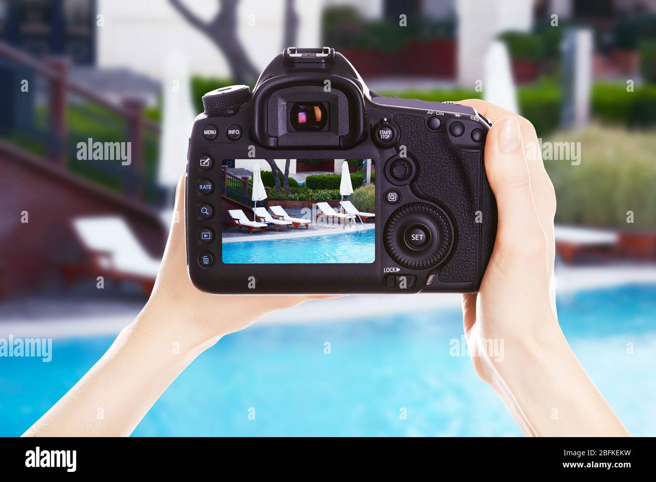 Photographer with camera at work Stock Photo - Alamy
