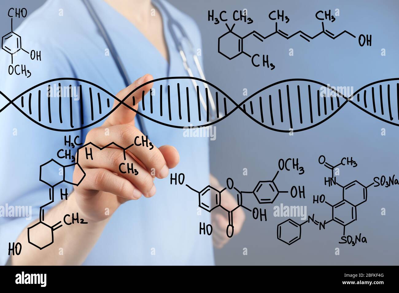 Young doctor working with drawing DNA molecule Stock Photo - Alamy