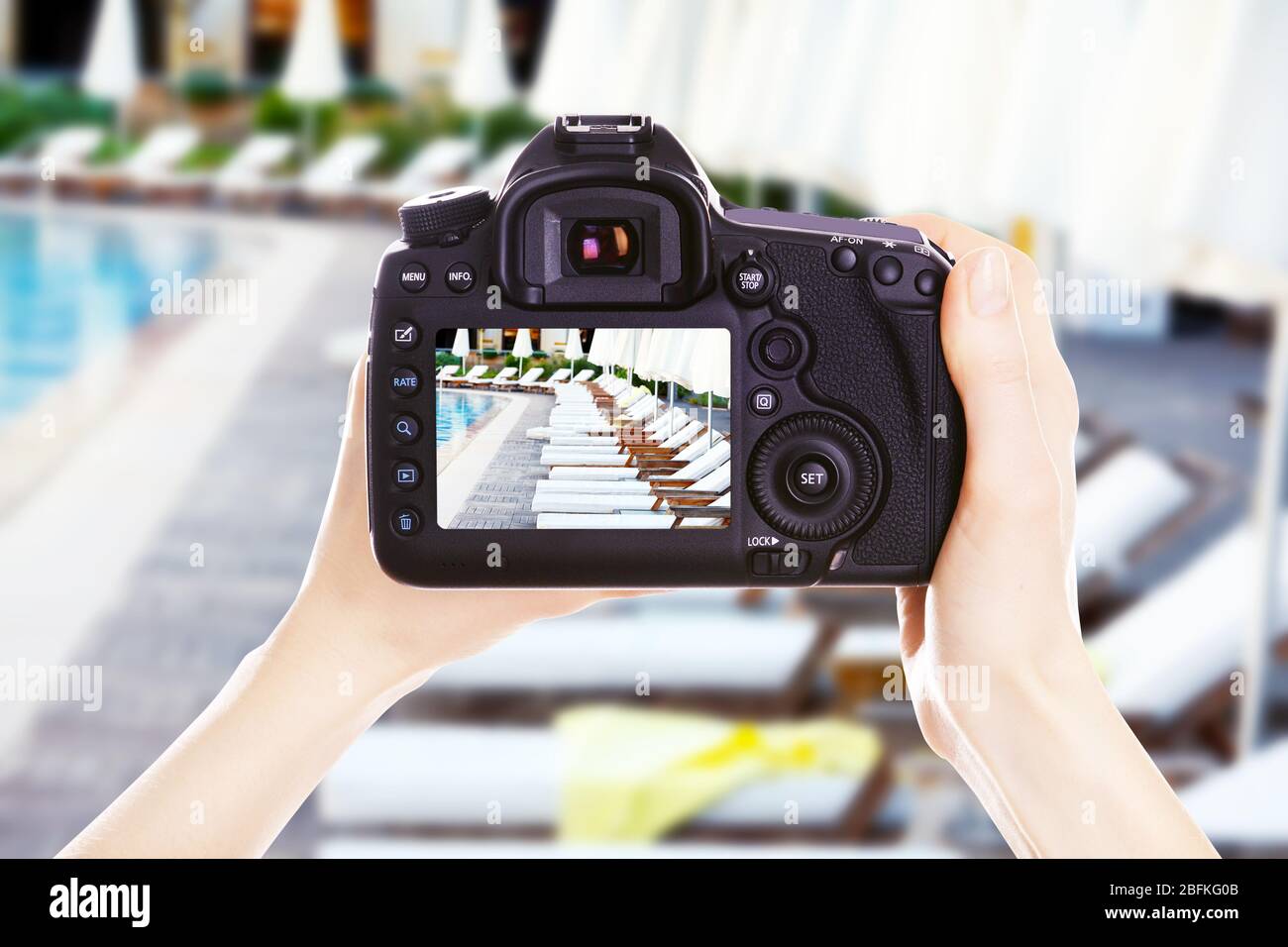 Photographer with camera at work Stock Photo - Alamy