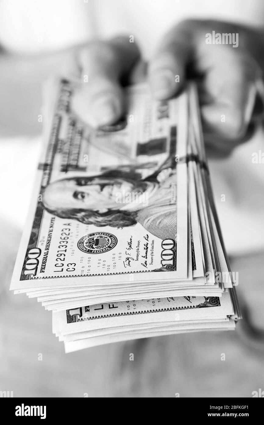 Hands money banknote business Black and White Stock Photos & Images - Alamy
