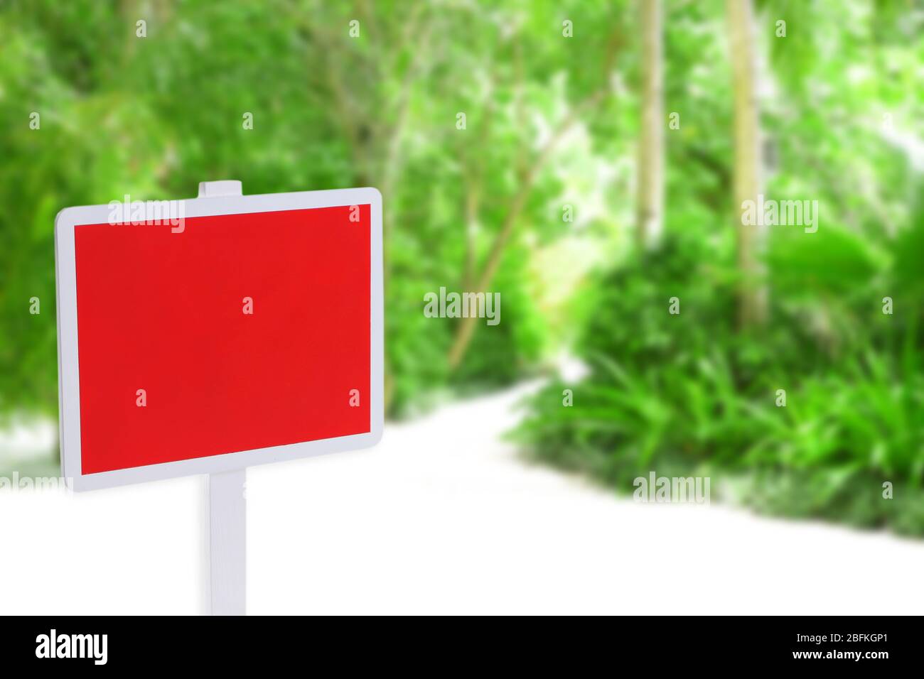 Wooden sign board on nature background Stock Photo - Alamy