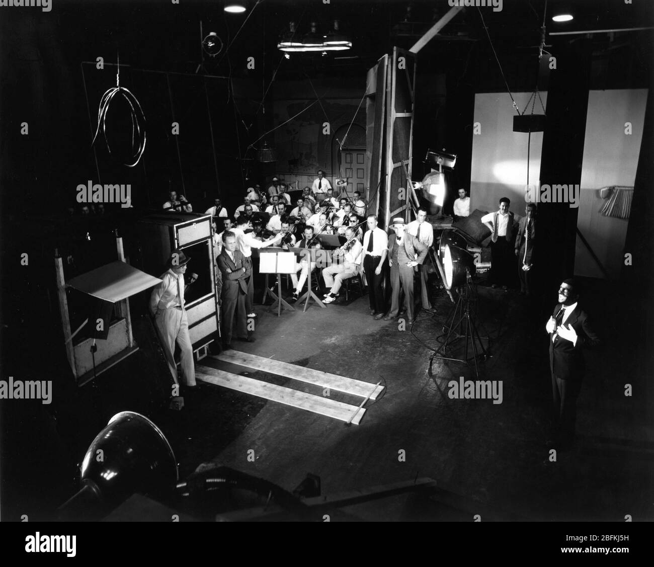 Director LLOYD BACON and camera crew in Booth filming AL JOLSON singing ...