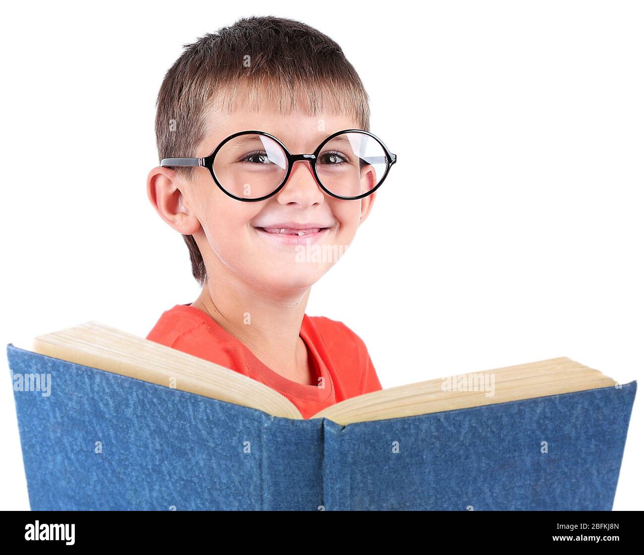 Little schoolboy with book isolated on white Stock Photo - Alamy
