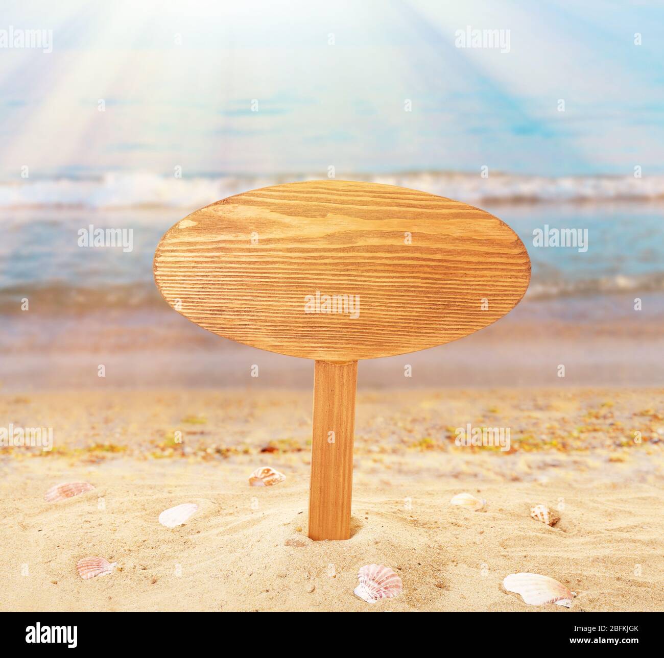 Wooden signboard on the sea background Stock Photo - Alamy