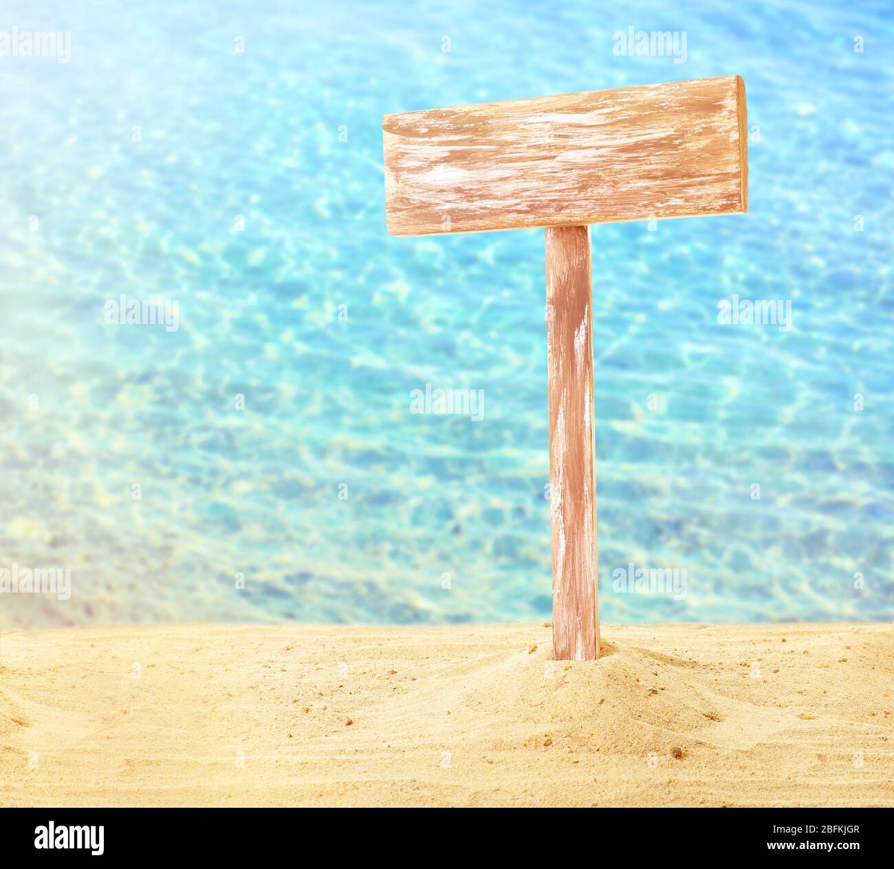 Wooden signboard on the sea background Stock Photo - Alamy
