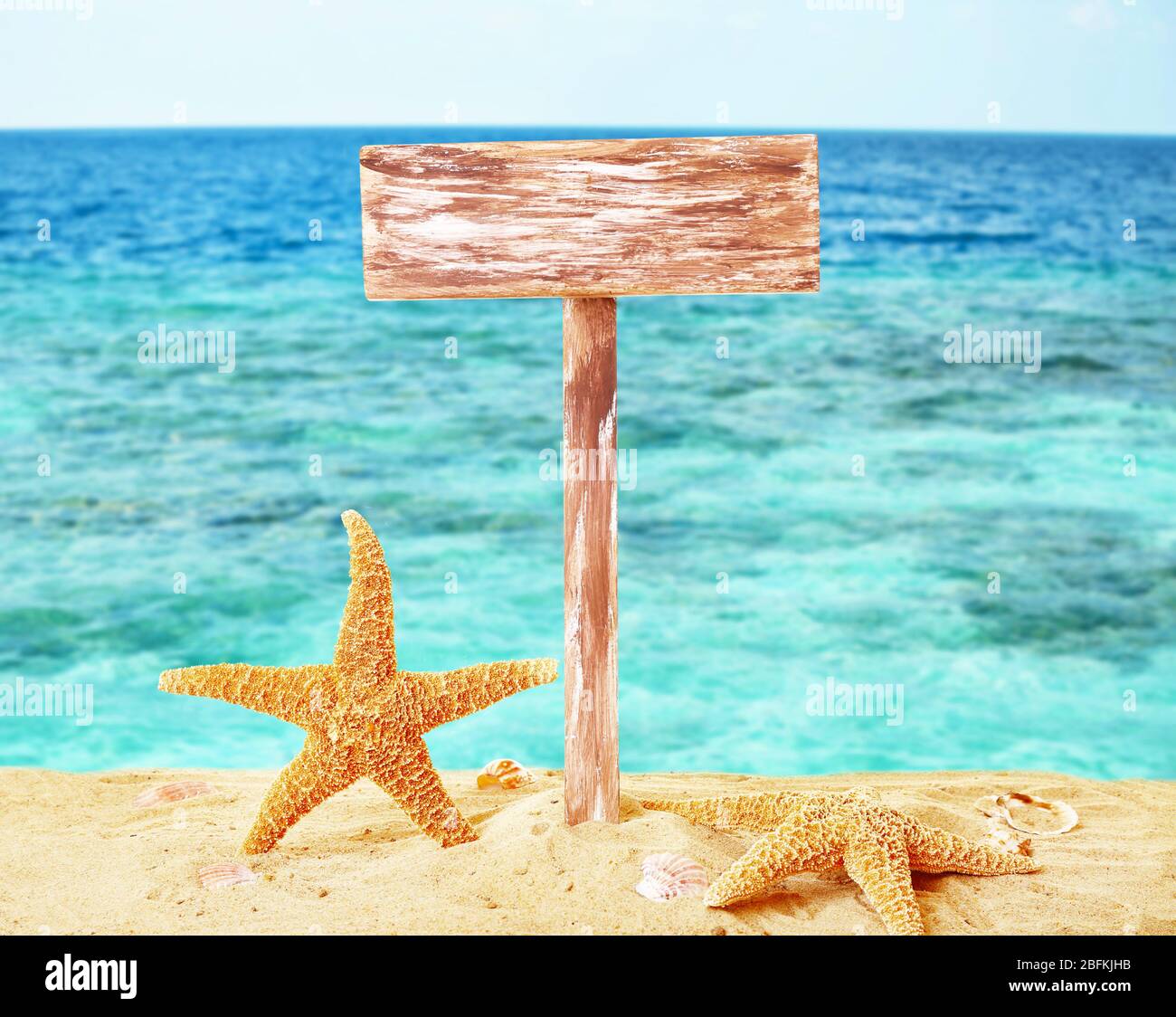 Wooden warning signboard on beach hi-res stock photography and images ...