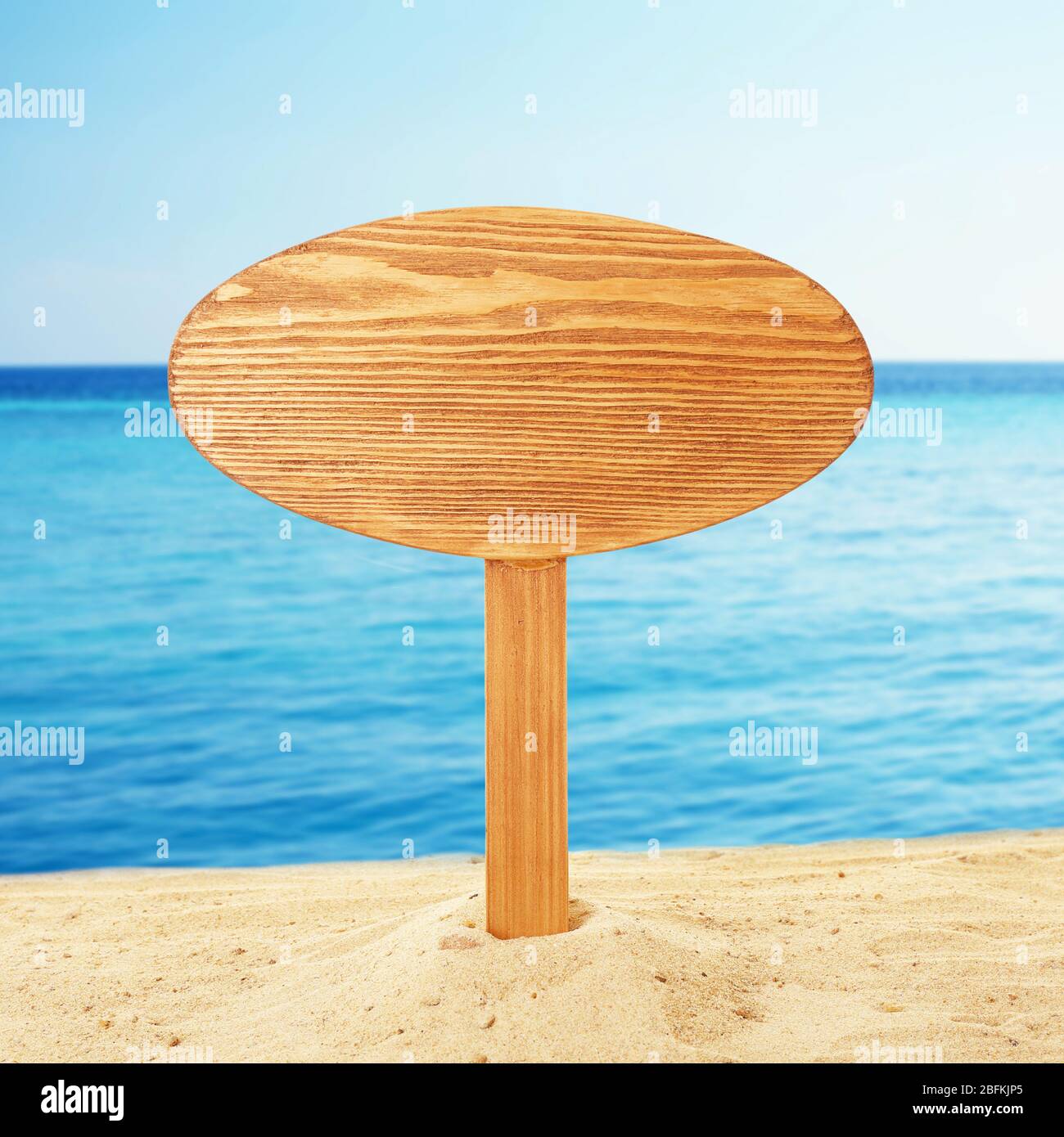 Wooden signboard on the sea background Stock Photo - Alamy