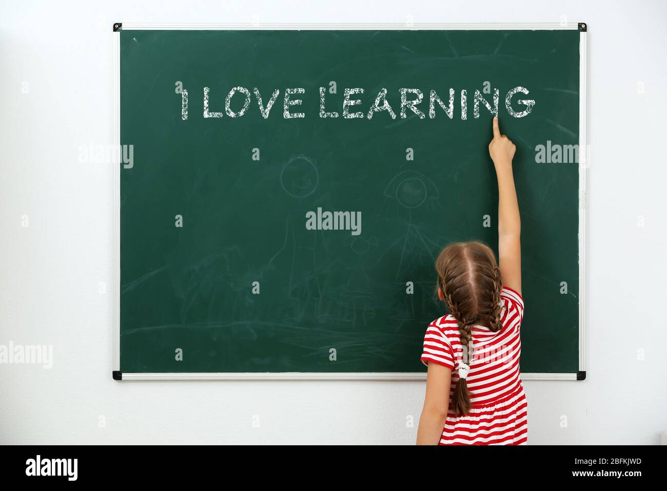 Girl at the blackboard. I love learning concept Stock Photo - Alamy