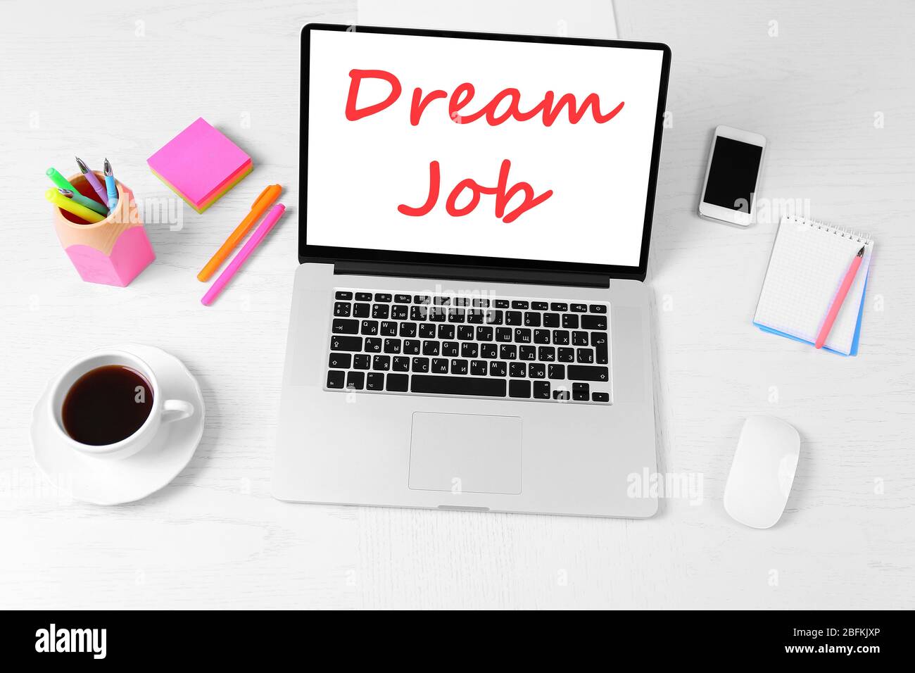 Dream job concept. Office workplace with open laptop on wooden desk ...