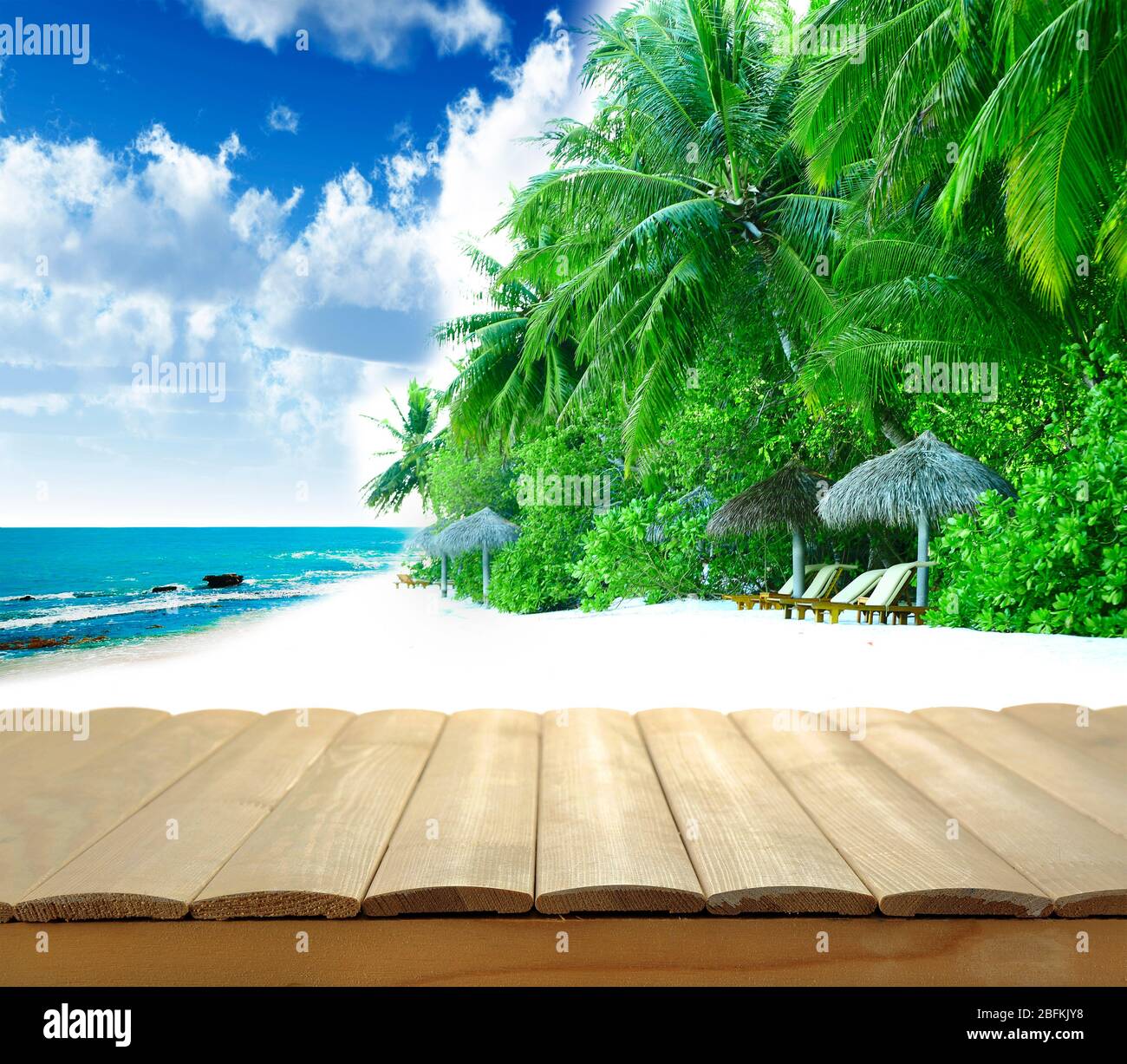 Wooden surface on exotic coastline background Stock Photo - Alamy
