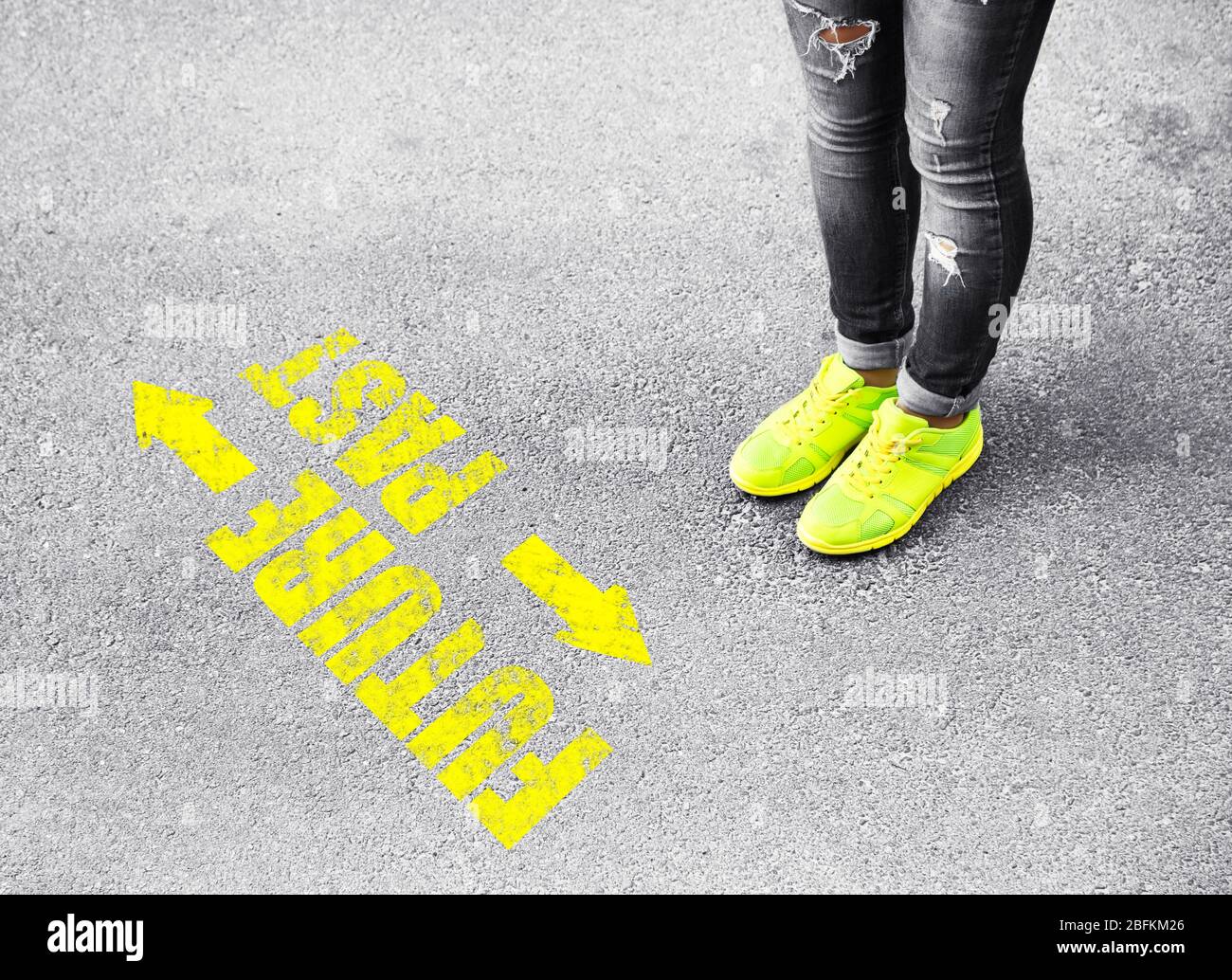 Female feet on road background Stock Photo - Alamy