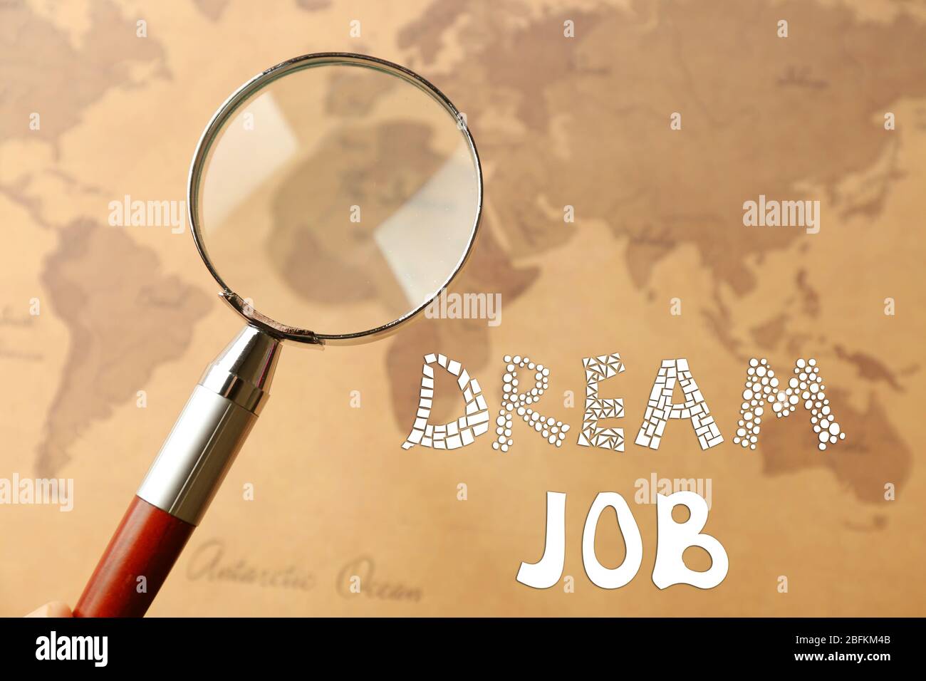 Dream job concept. World map with magnifying glass Stock Photo - Alamy