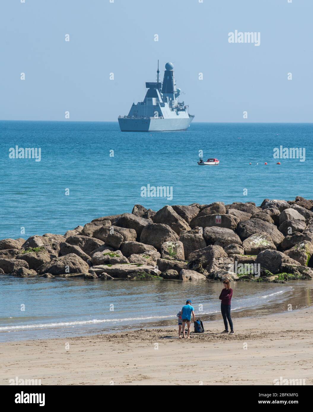 Lyme Regis, Dorset, UK. 19th Apr, 2020. UK Weather: Royal Navy Warship ...