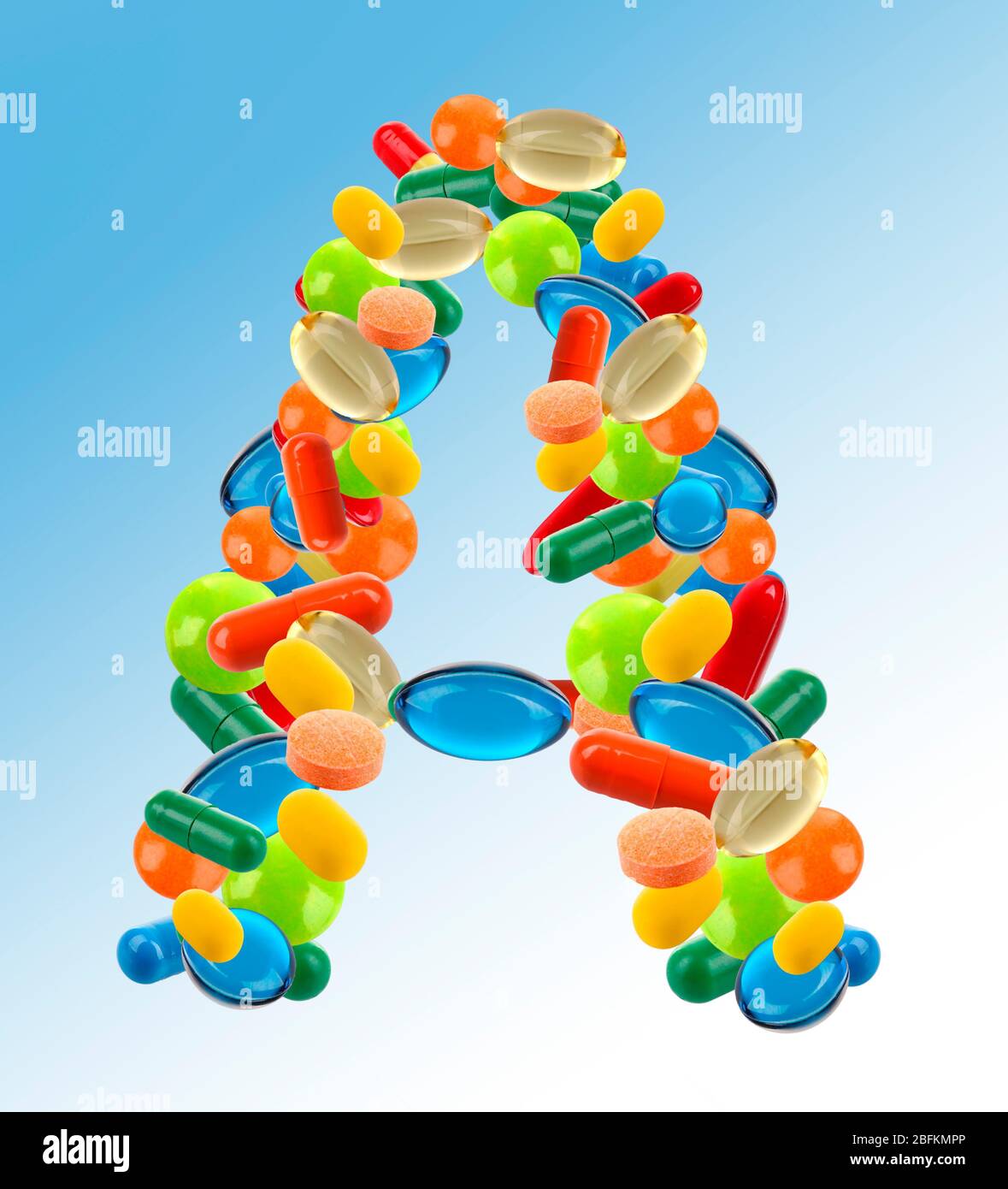 Letter A made of different pills on bright blue background Stock Photo ...