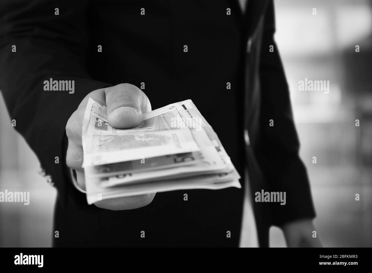 Budget male Black and White Stock Photos & Images - Alamy