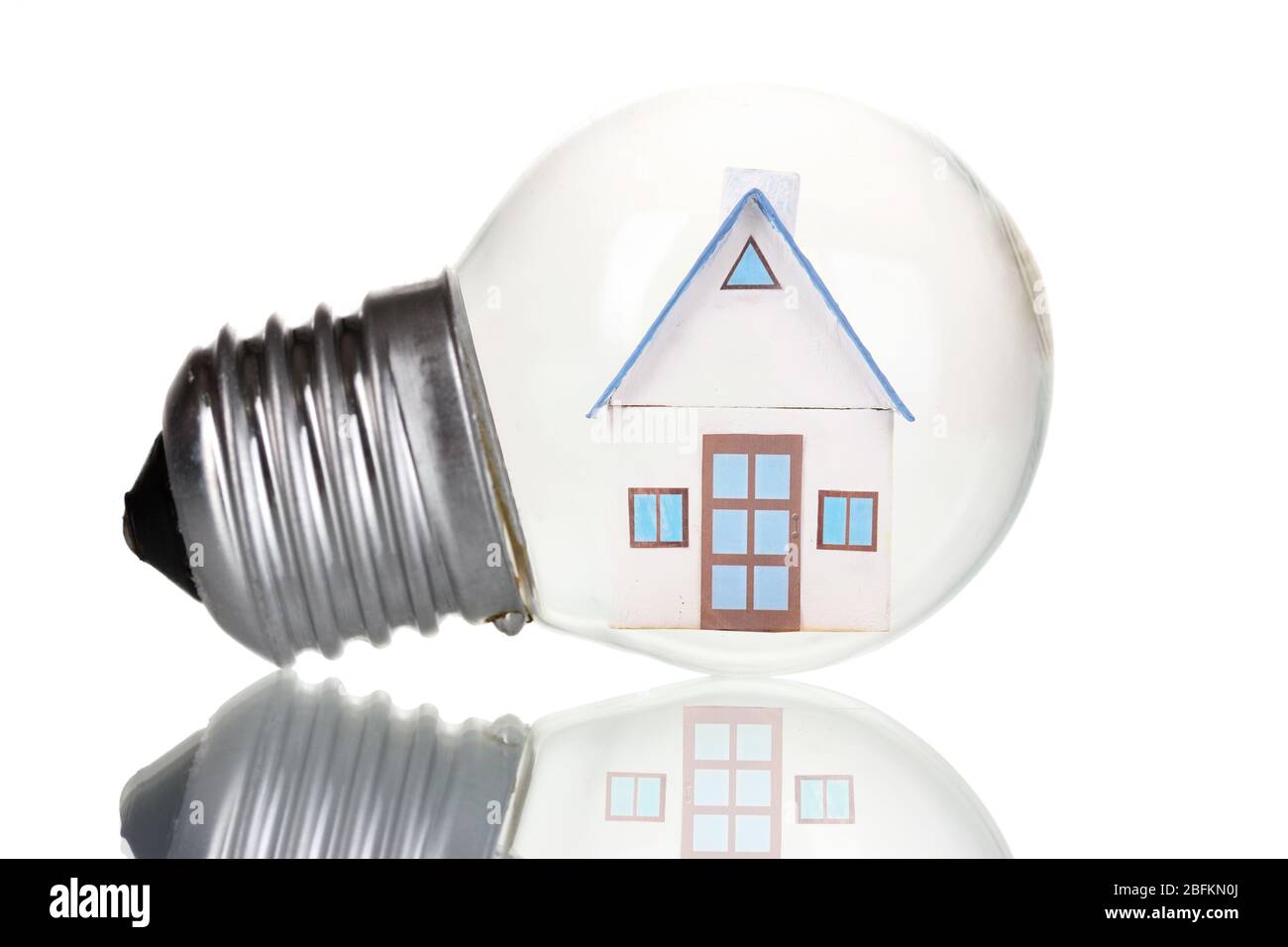 House inside light bulb, isolated on white Stock Photo - Alamy