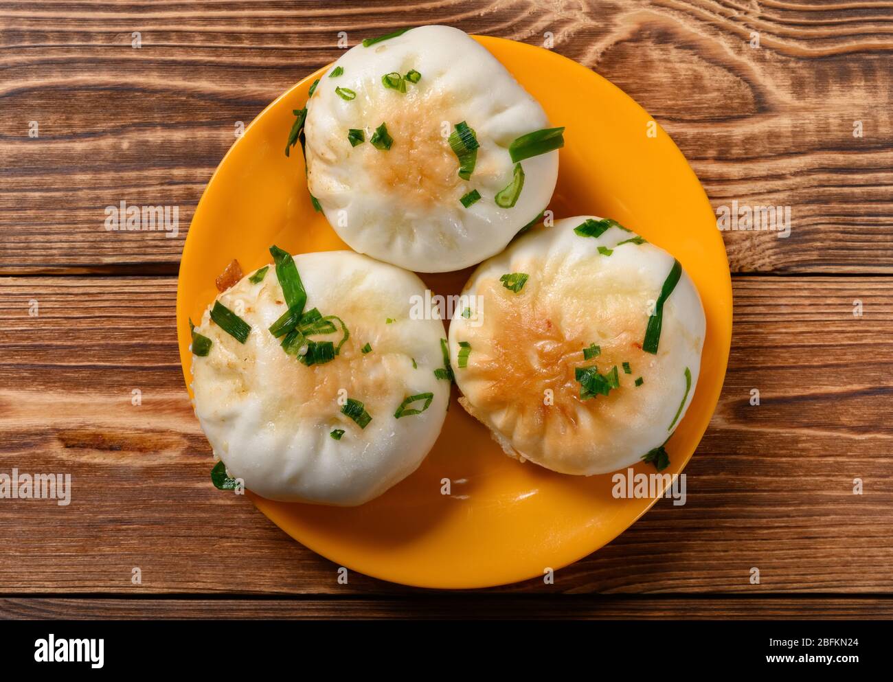 top view traditional Chinese fried bun on a wood table Stock Photo - Alamy