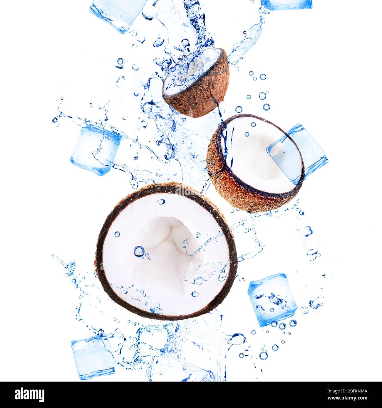 Coconuts and ice cubes in water splashing isolated on white Stock Photo ...