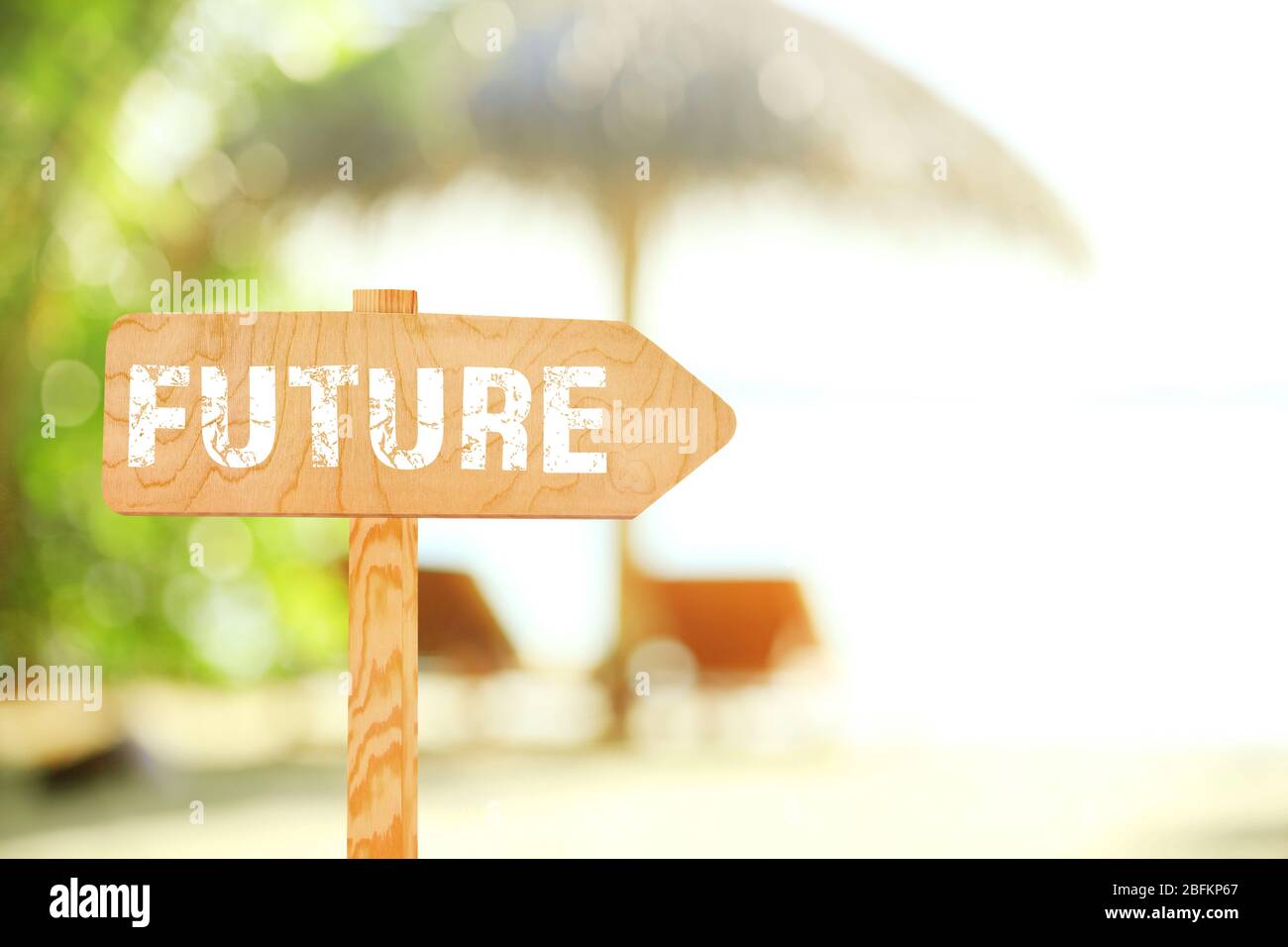 Future concept. Wooden sign board on beach background Stock Photo - Alamy