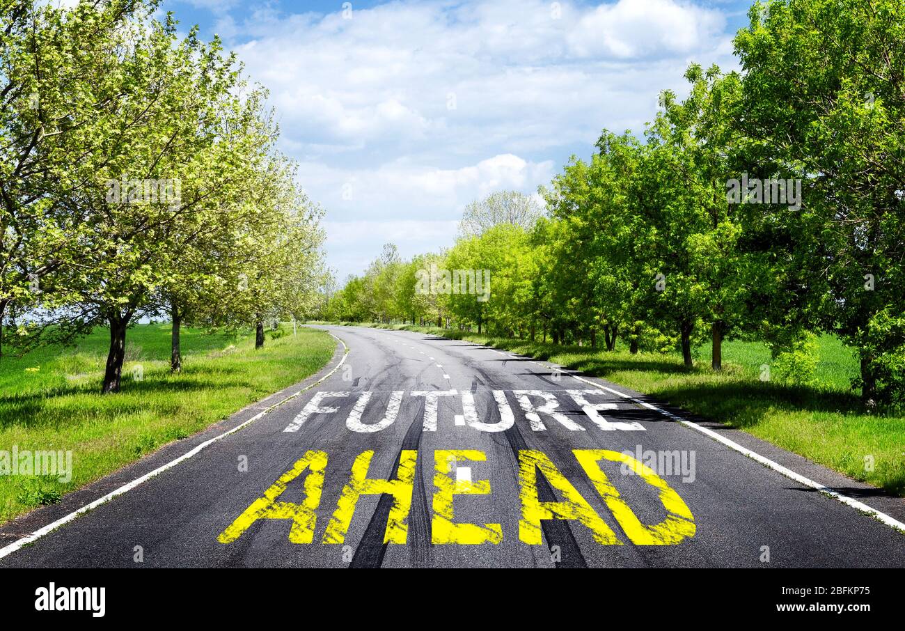 Future concept. Text Future ahead with arrow marking on road surface ...